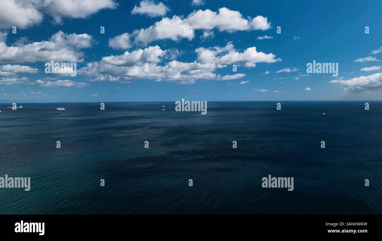 Aerial view of tranquil ocean with ships and clouds, Gibraltar Stock ...
