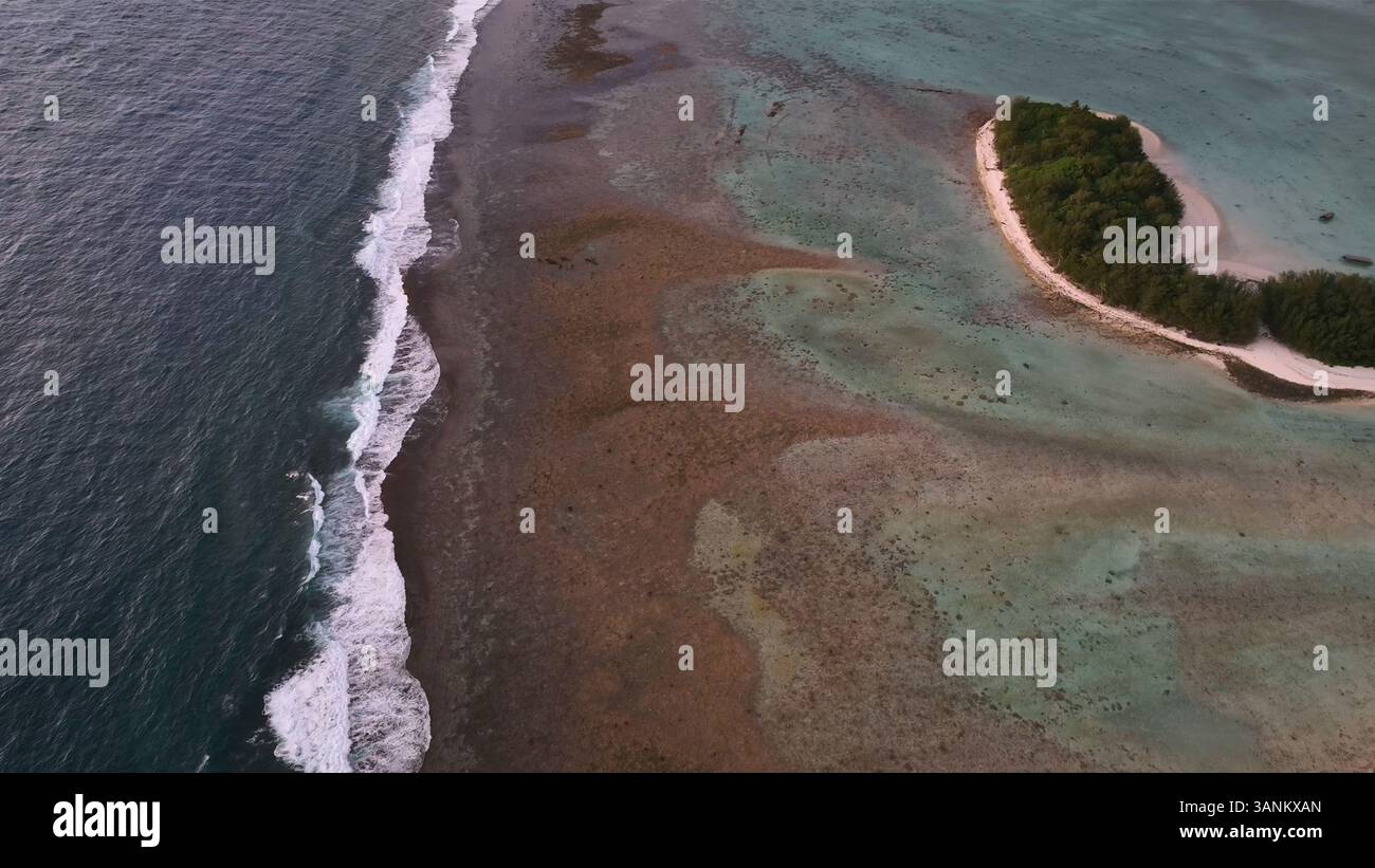 Aerial view of a beautiful tropical island with turquoise waters and ...