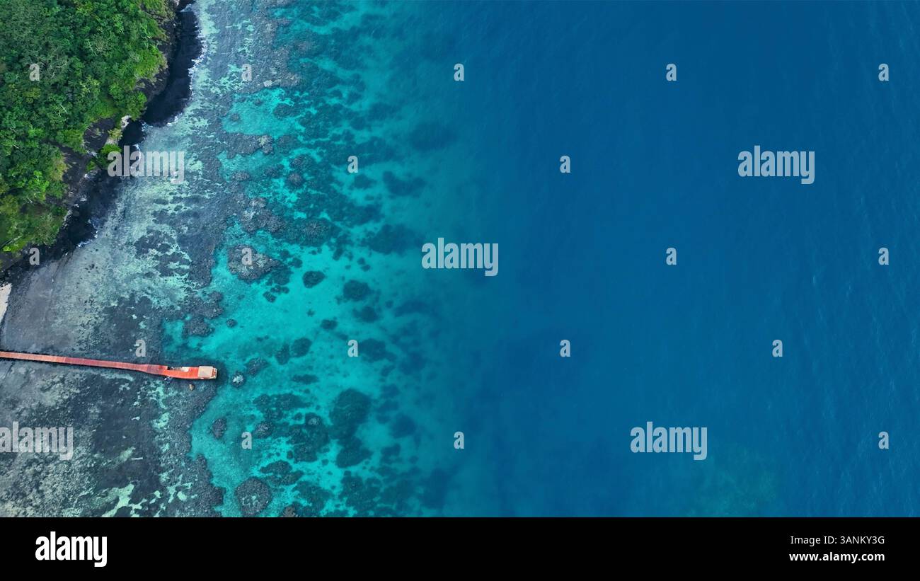 Aerial view of abstract island with crystal clear water and tropical ...