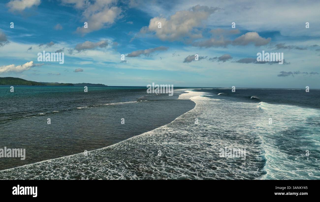 Aerial view of serene tropical beach with waves and reef, fiji Stock ...