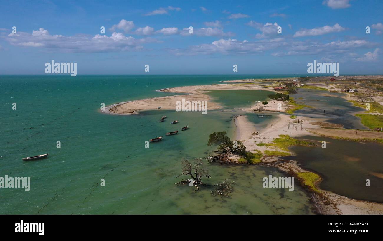 Aerial view of tropical beach with boats and sand bar, Manaure, La ...