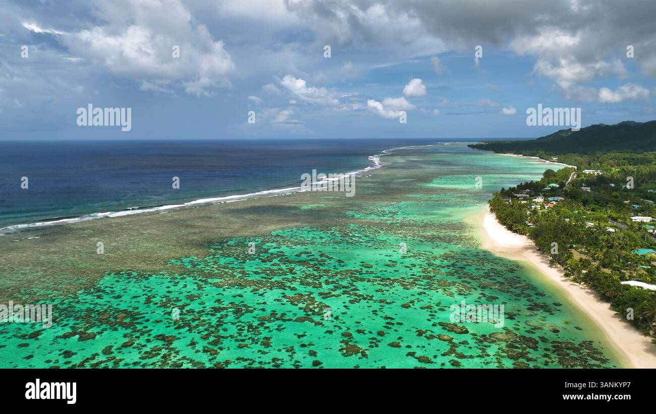 Aerial view of beautiful tropical beach with turquoise water and coral ...