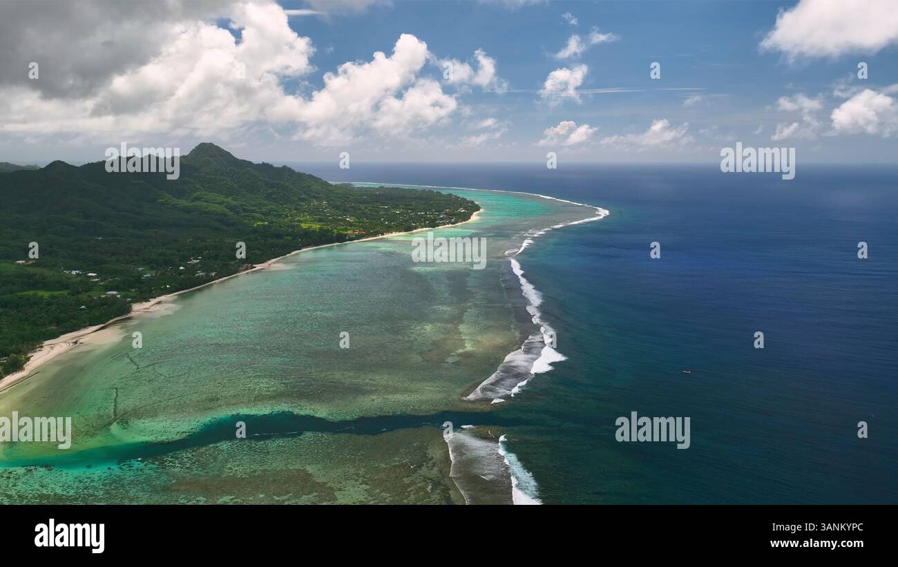 Aerial view of beautiful tropical coastline with coral reef and serene ...