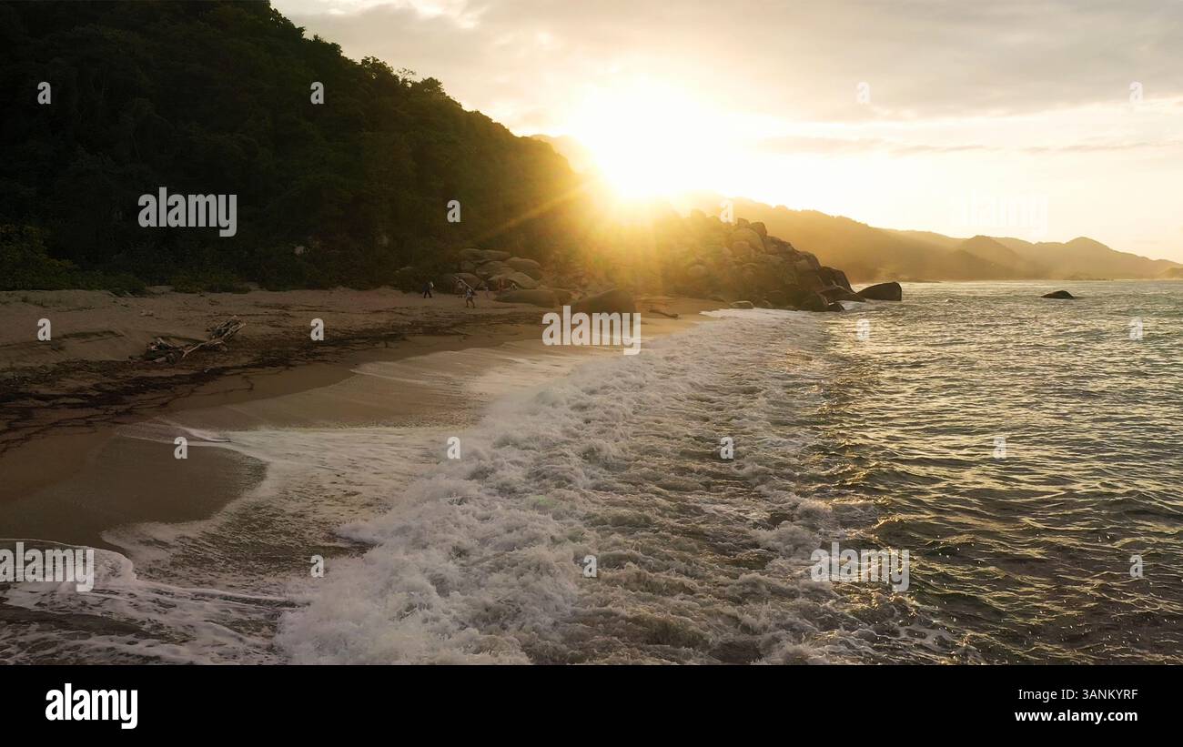 Aerial view of coastal jungle sunset by the ocean, Santa Marta ...