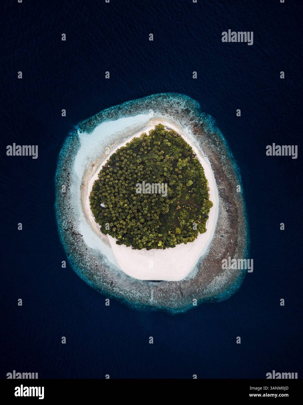 Aerial view of the second smallest island from the famous baa atoll ...