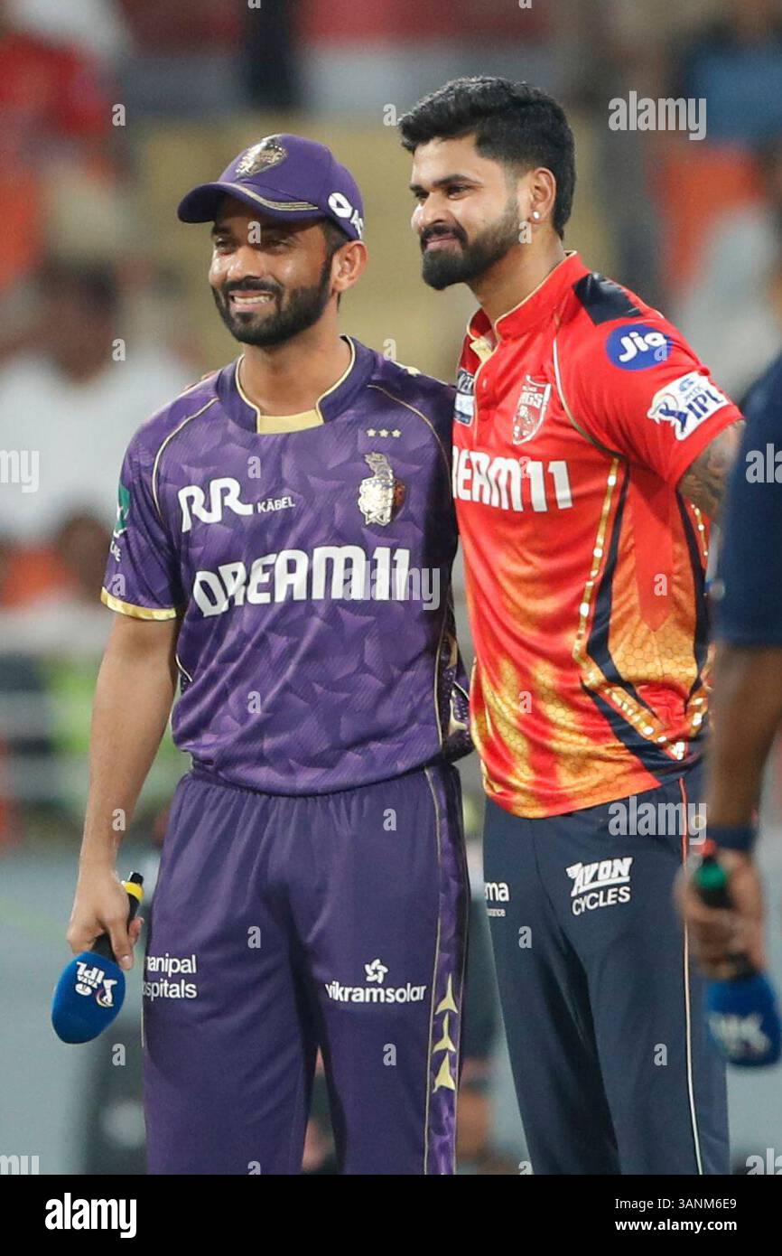 Kolkata Knight Riders' captain Ajinkya Rahane, left, and Punjab Kings ...