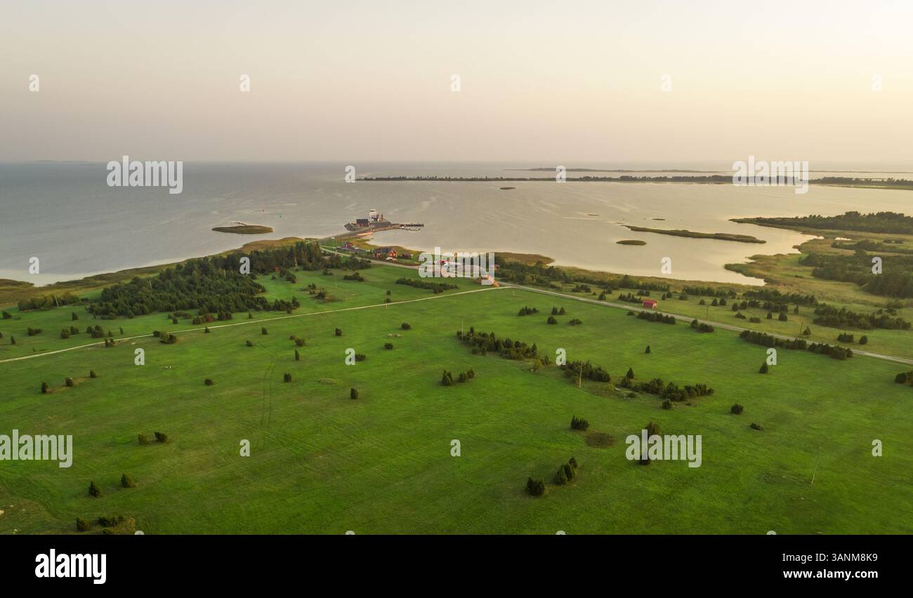 Aerial view of road going through village and fields on Forby on Vormsi ...