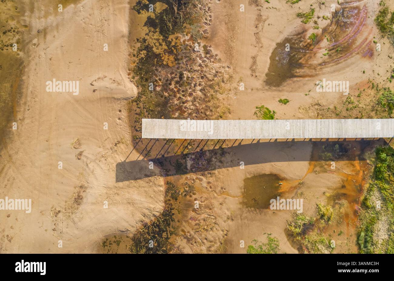 Aerial view of long wood pier above sandy shore, Estonia Stock Photo ...