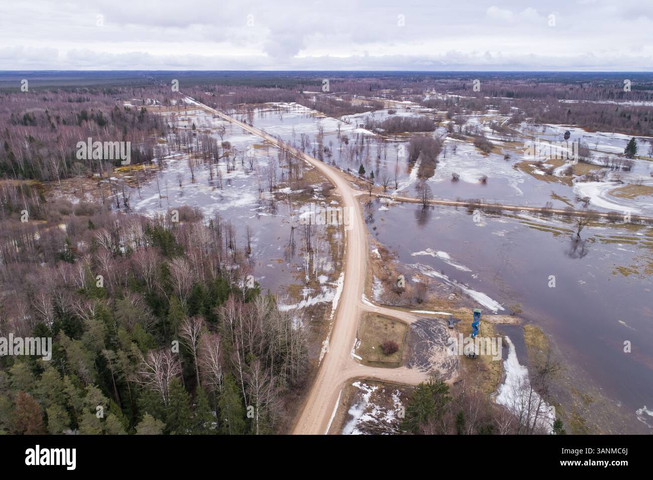 Aerial view of a road surrounded by water with snow Tipu, Viljandi County, Estonia Stock Photo ...
