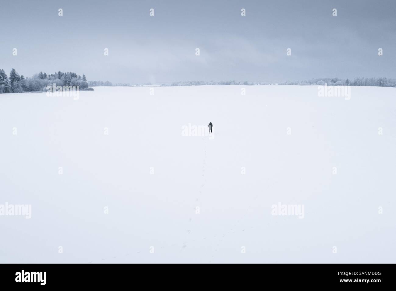 Man walking alone winter drone hi-res stock photography and images - Alamy