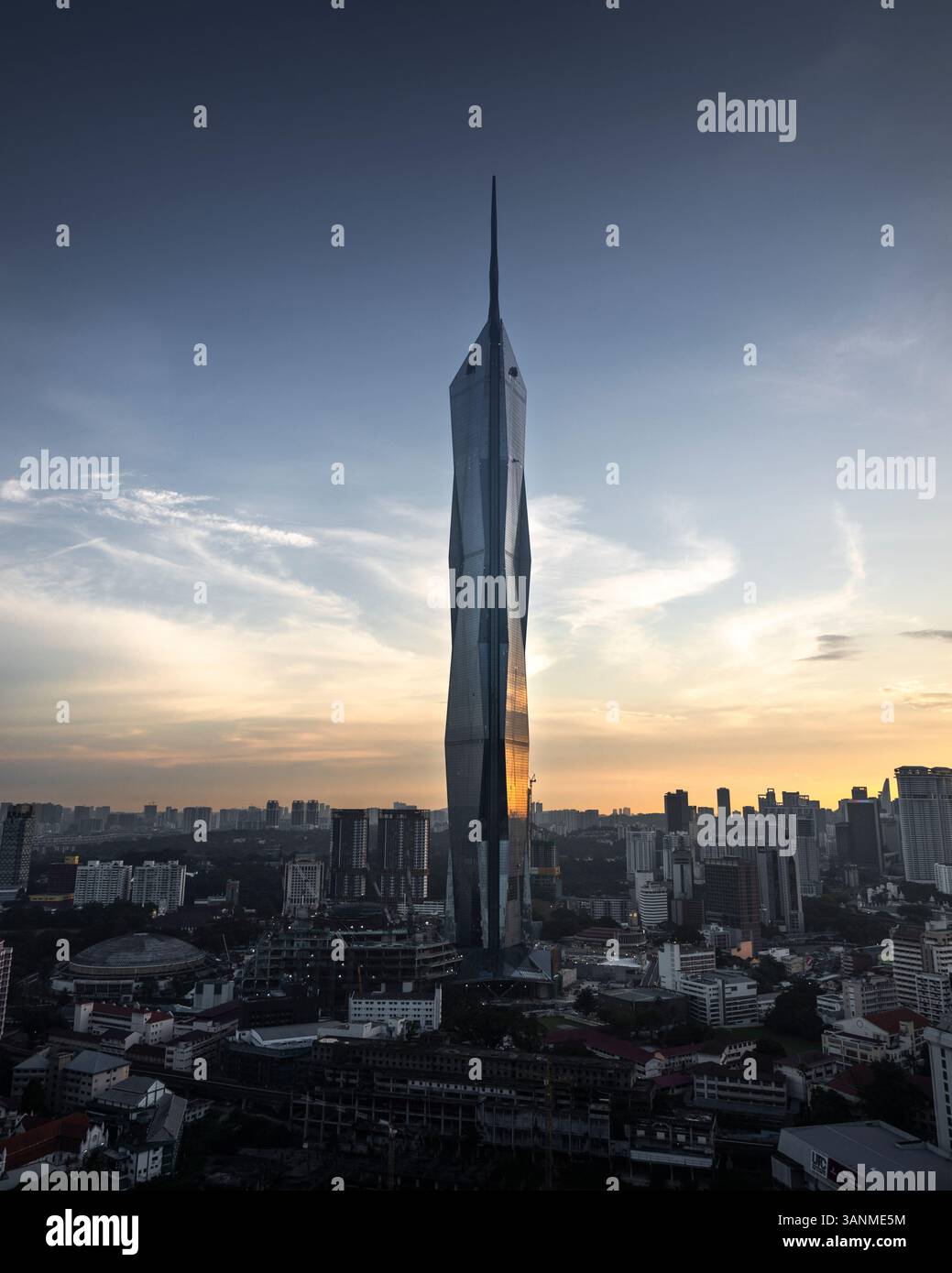 Aerial view of the majestic Merdeka 118 skyscraper against a beautiful ...