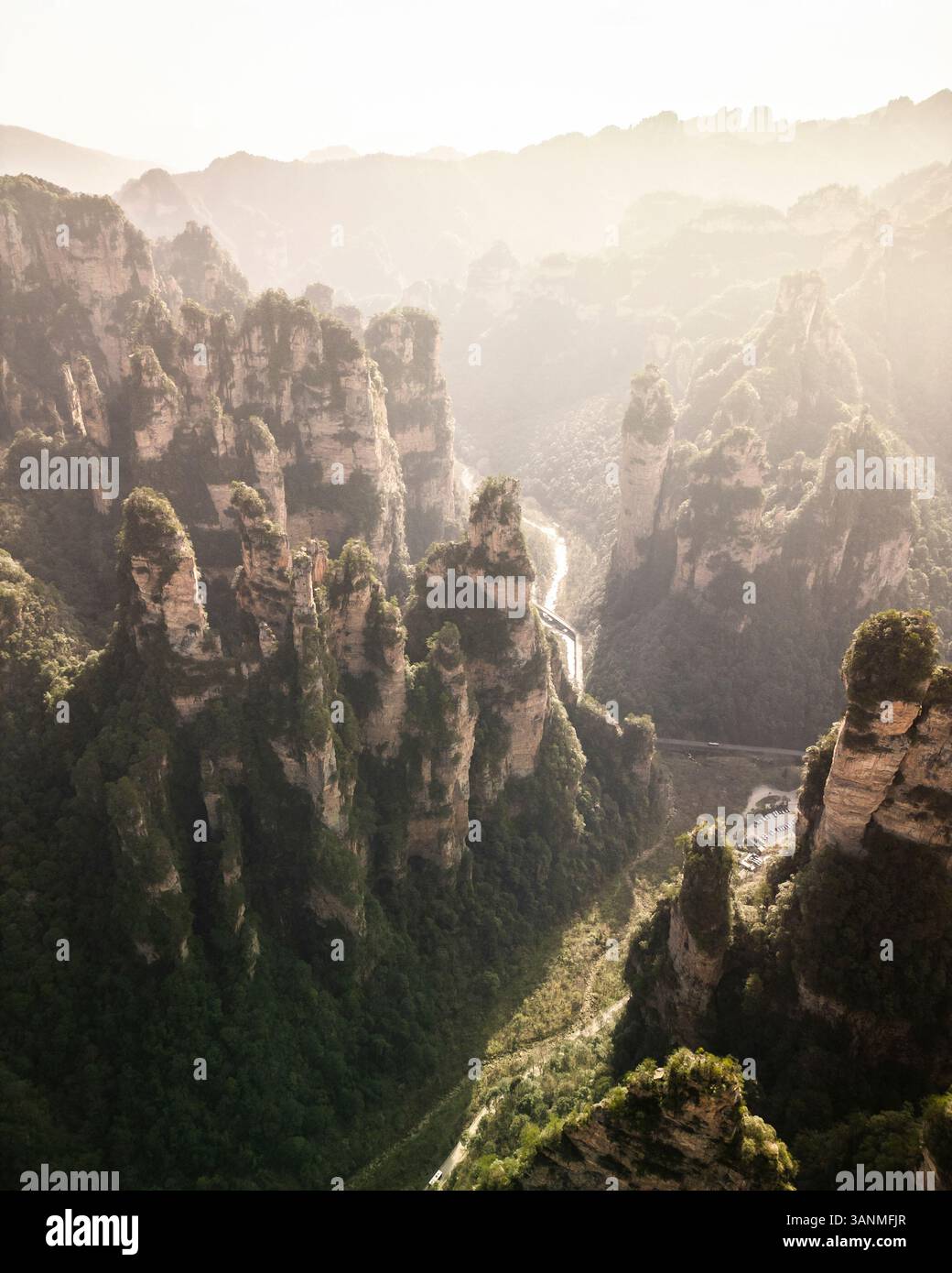 Aerial view of majestic rock formations and rugged mountains in a ...