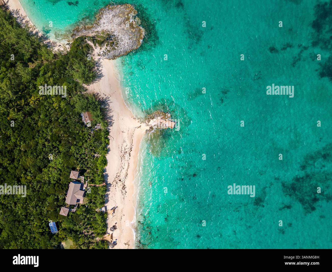 Aerial view of turquoise waters and sandy shores of Rose Island, New ...