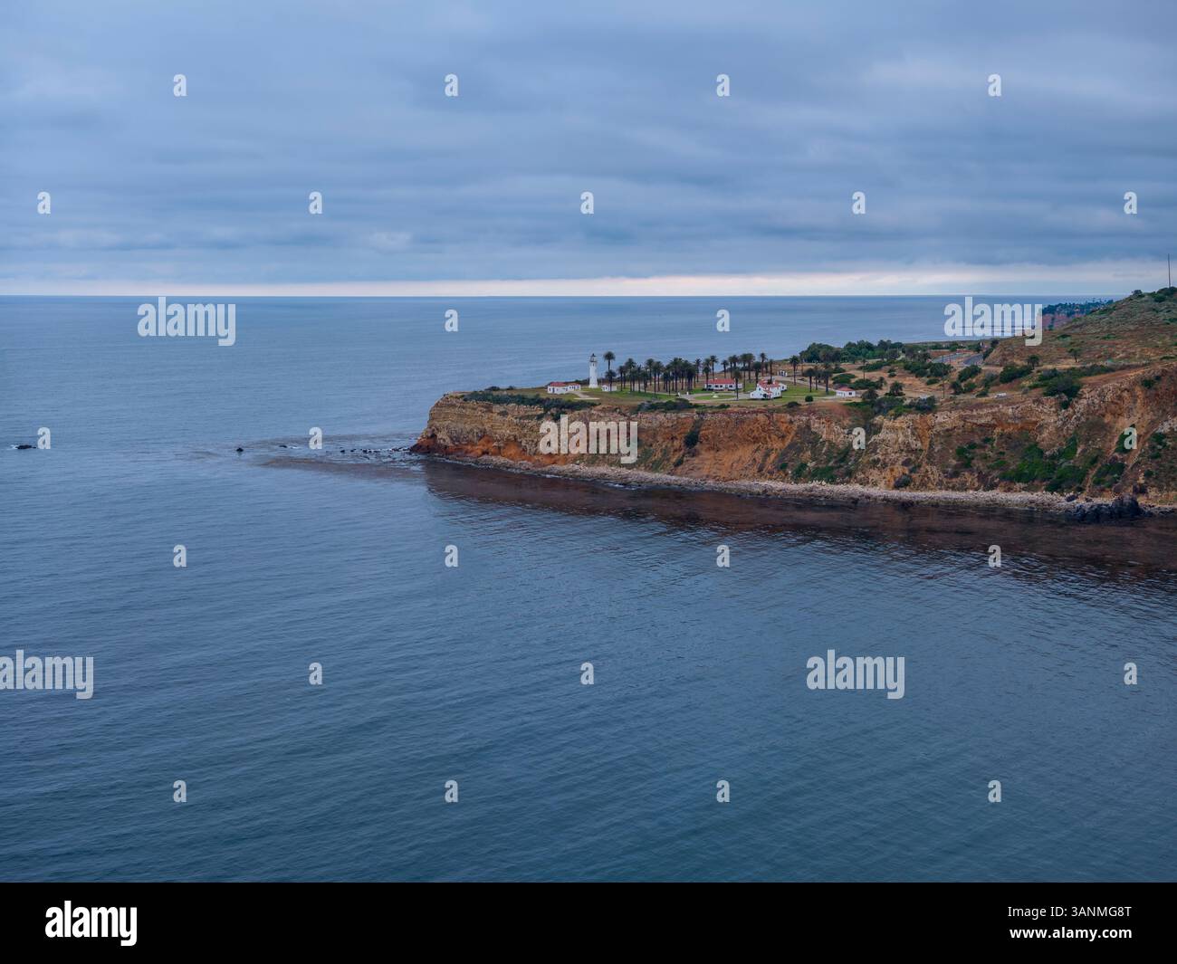 Aerial view of rugged coastal cliffs at sunset, Point Vicente ...