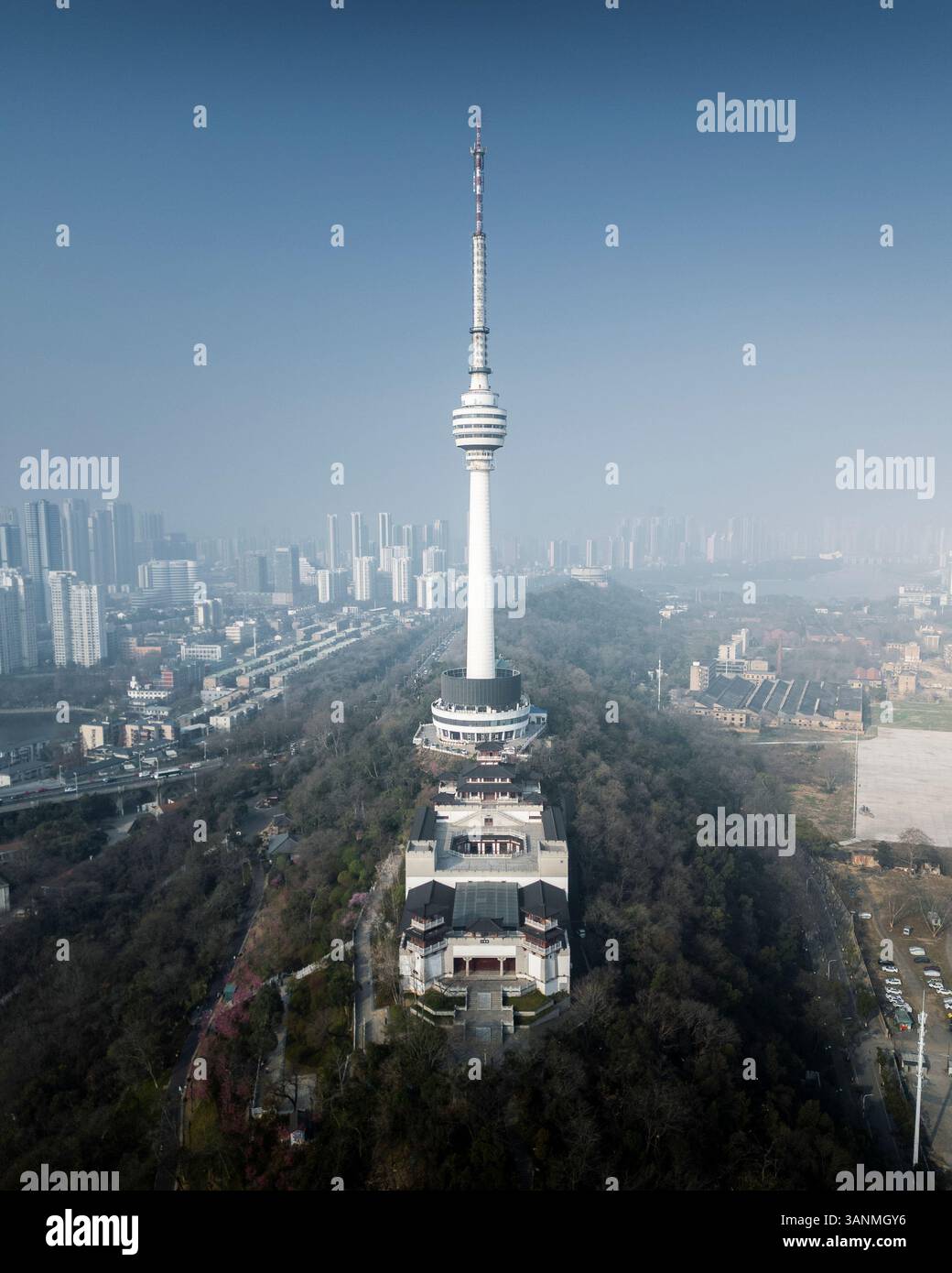 Aerial view of modern cityscape with Tortoise Mountain TV Tower and ...