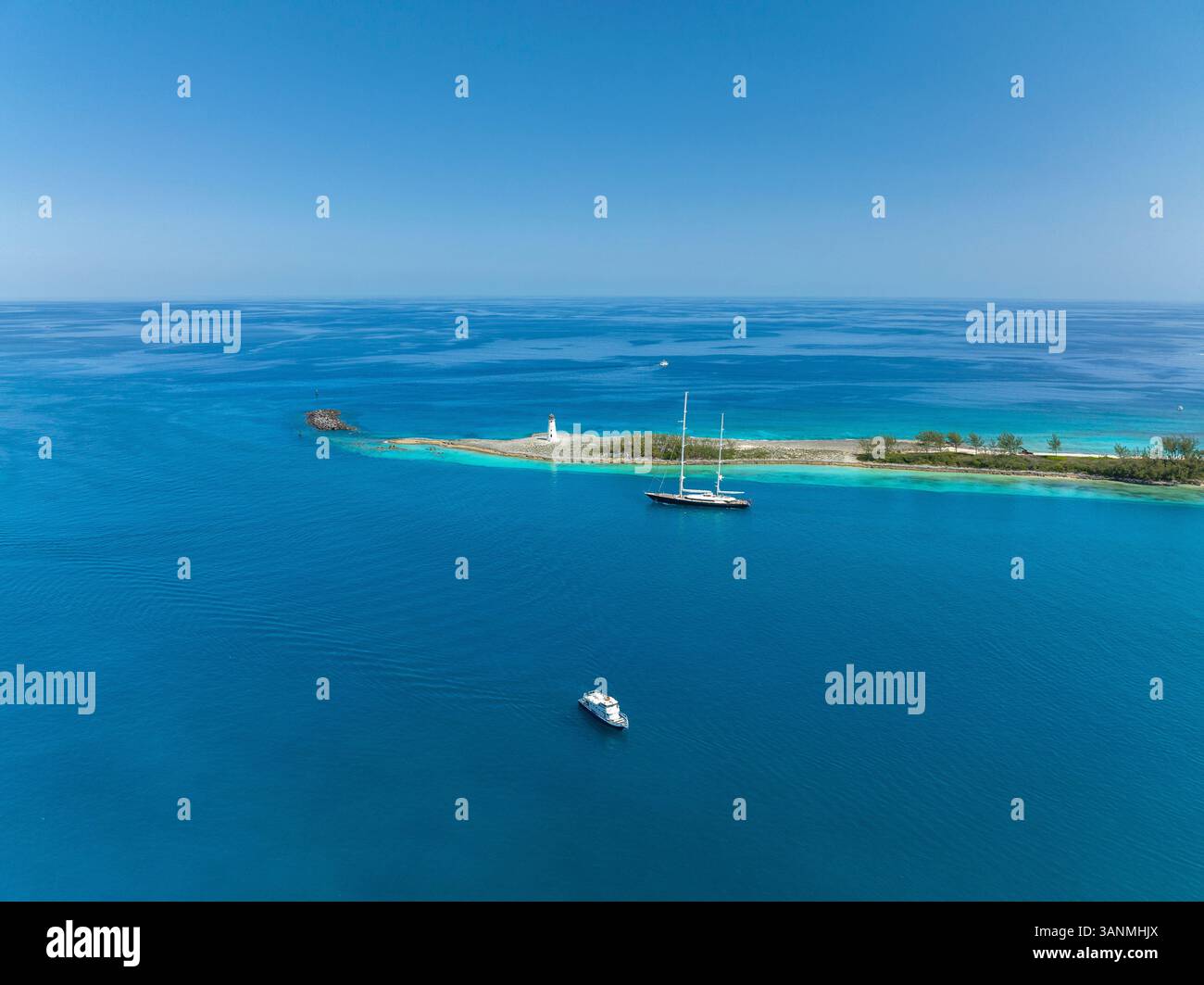 Aerial view of turquoise waters and Nassau Harbour Lighthouse on ...