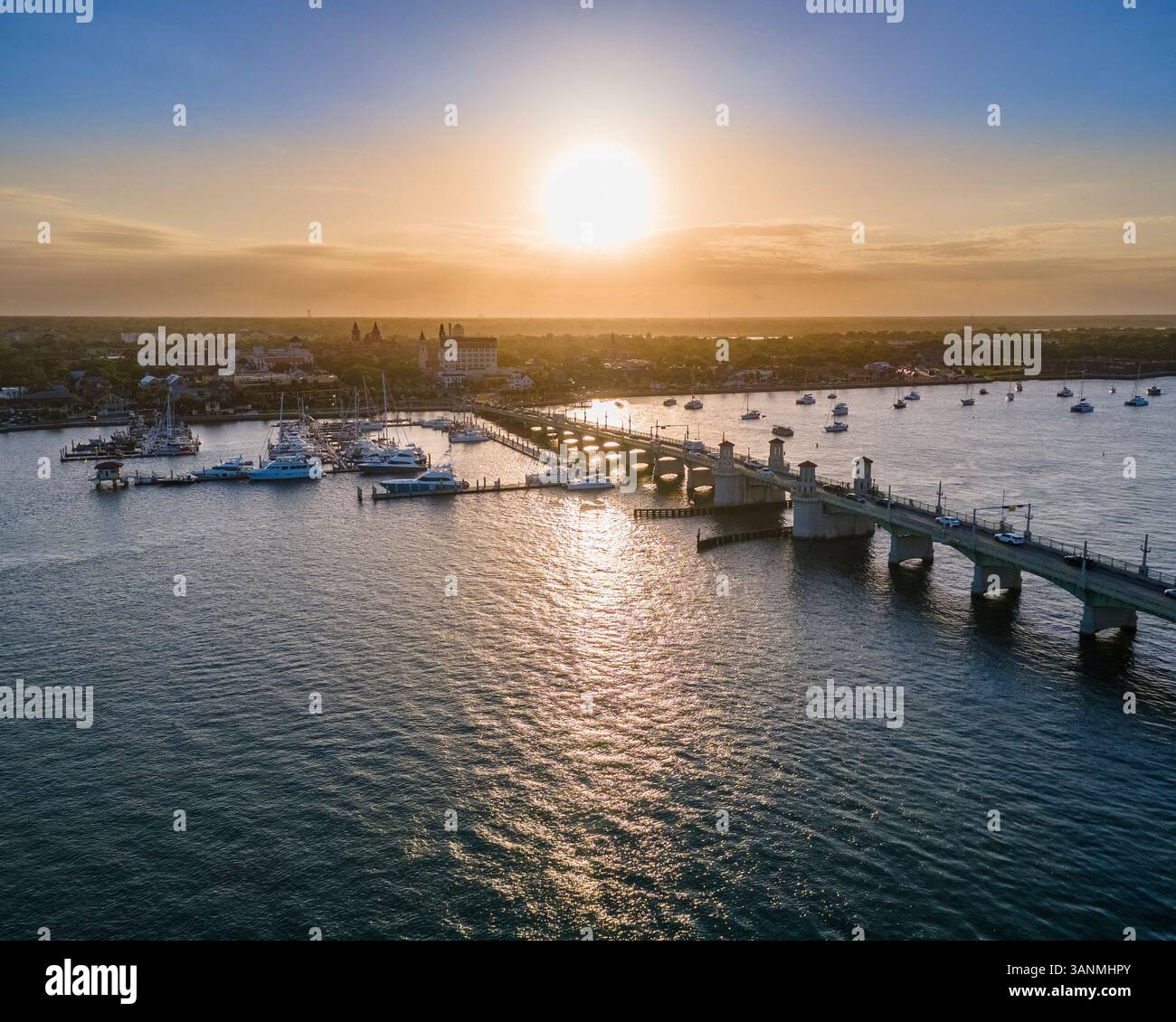 Aerial View at sunset of the Bridge of Lions looking towards historic ...