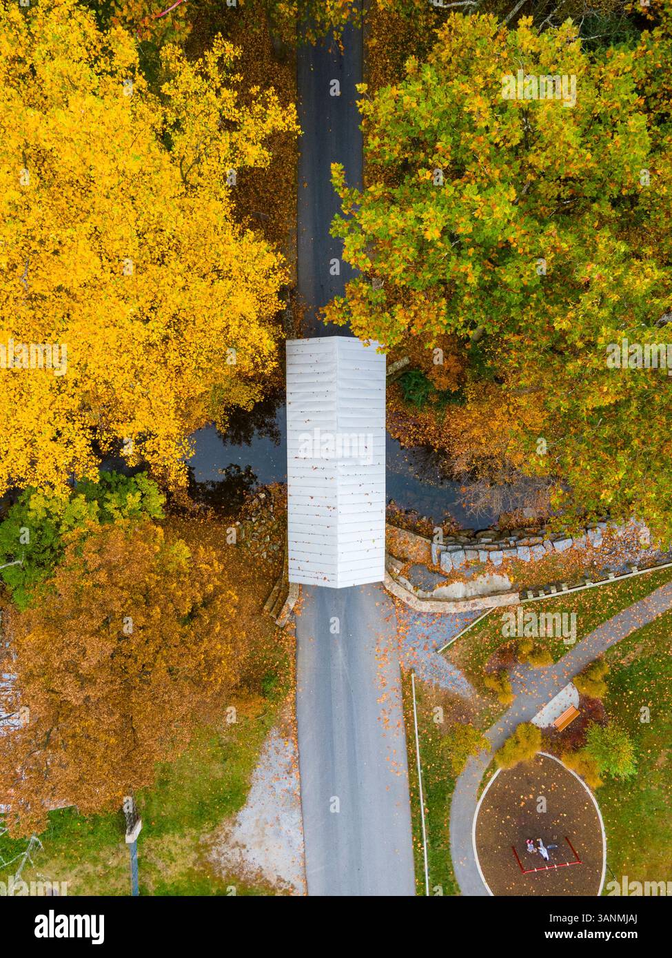 Aerial view of the Roddy Road Covered Bridge in autumn in Thurmont ...