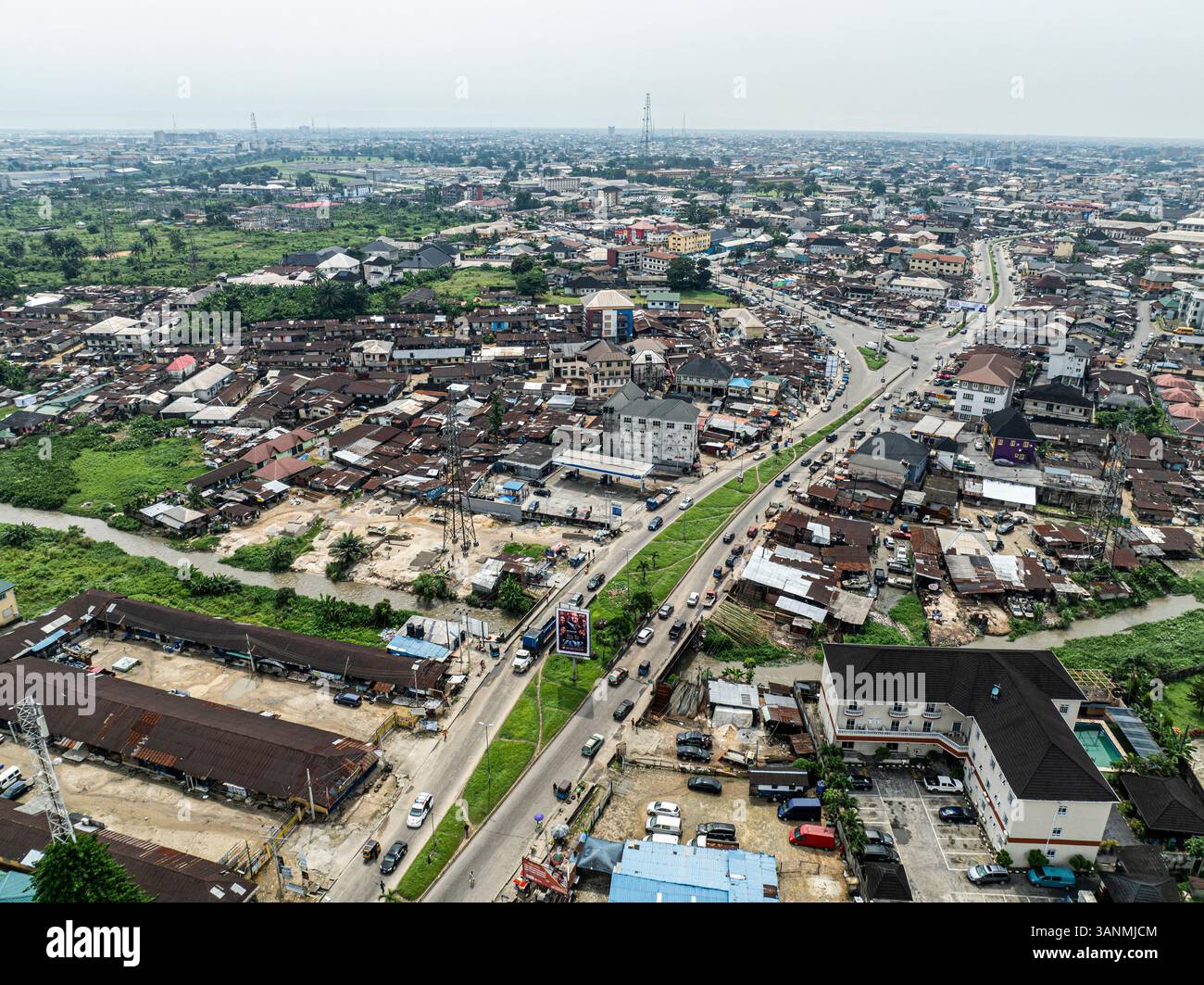 Aerial view of vibrant urban cityscape with modern buildings and busy roads, Port Harcourt ...