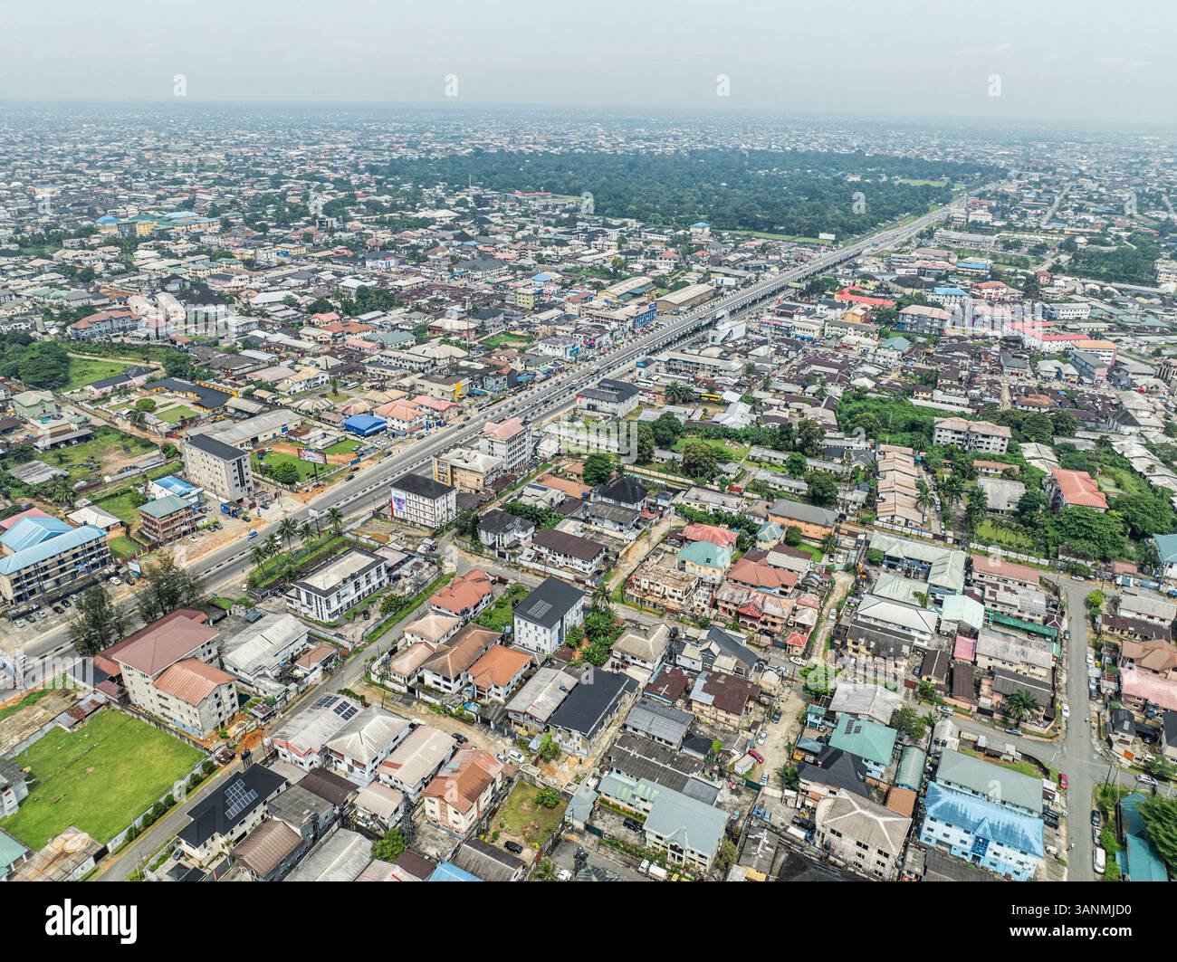 Aerial view of vibrant cityscape with modern buildings and busy roads ...