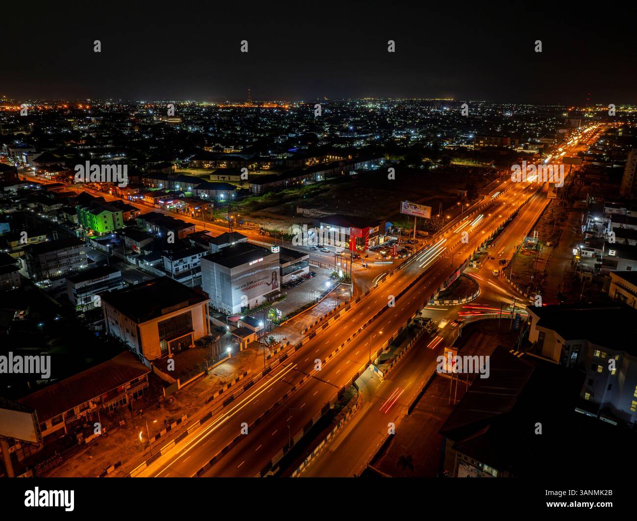 Aerial view of bustling Gra junction with illuminated buildings and ...