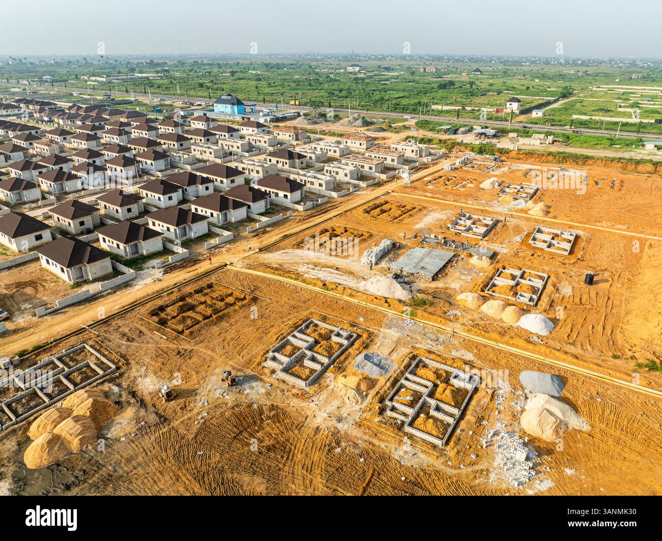 Aerial view of construction site and housing development in greater taf ...