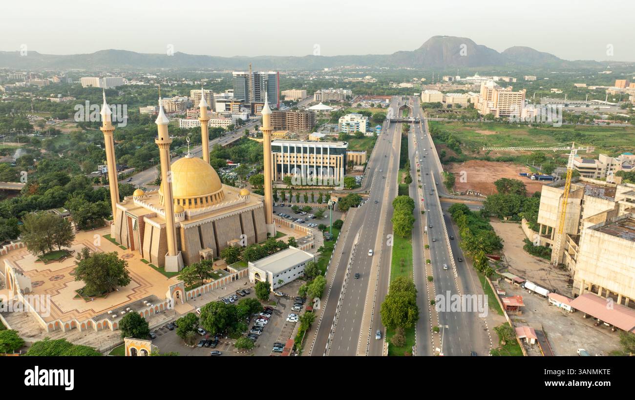 Aerial view of the national mosque surrounded by modern buildings and ...