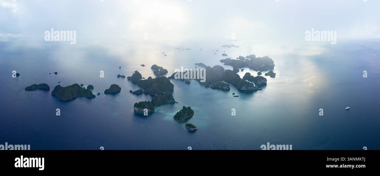 Scenic limestone islands rise from the seascape of Misool, Indonesia ...