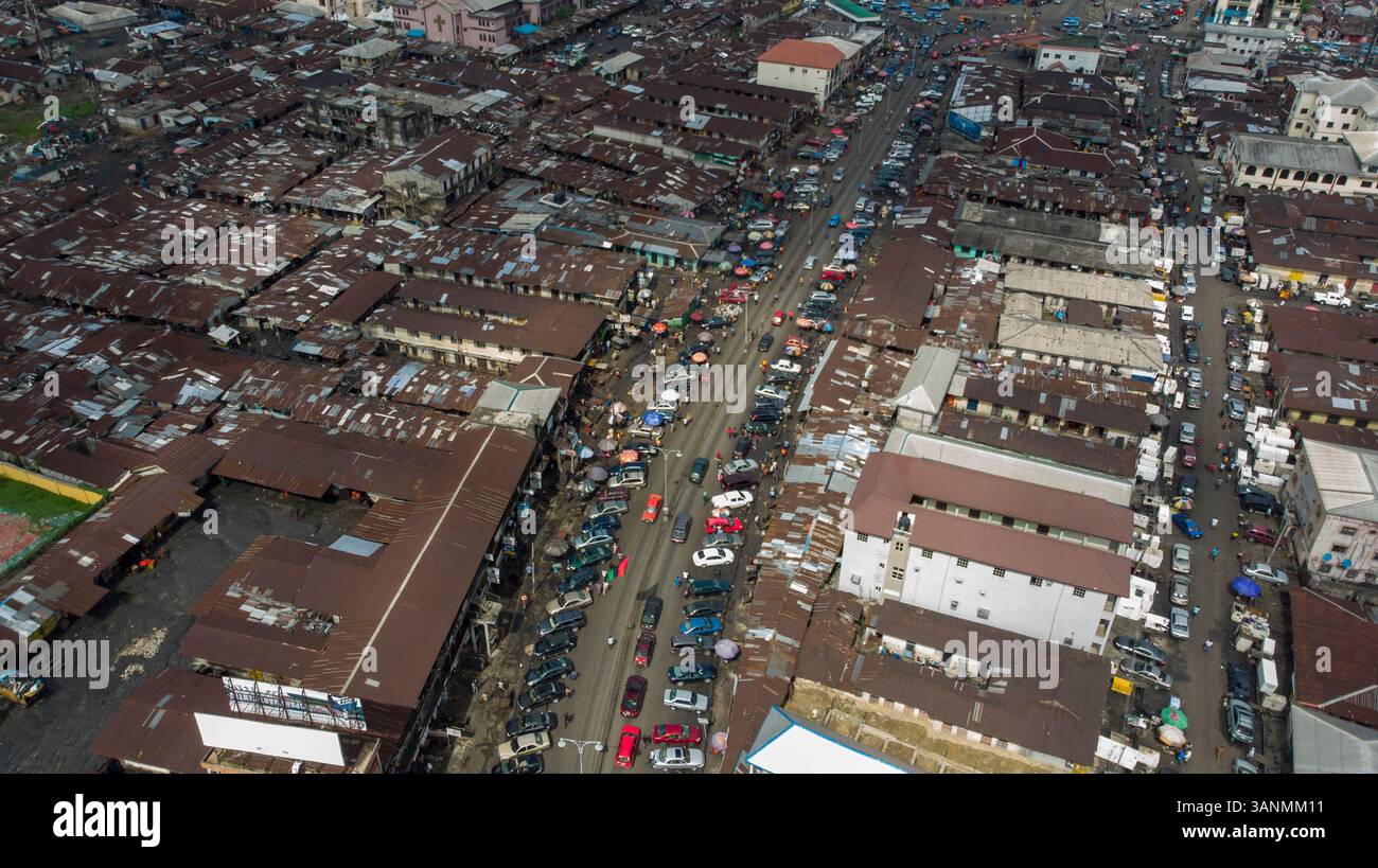 Aerial view of busy urban landscape with rooftops and dense buildings ...