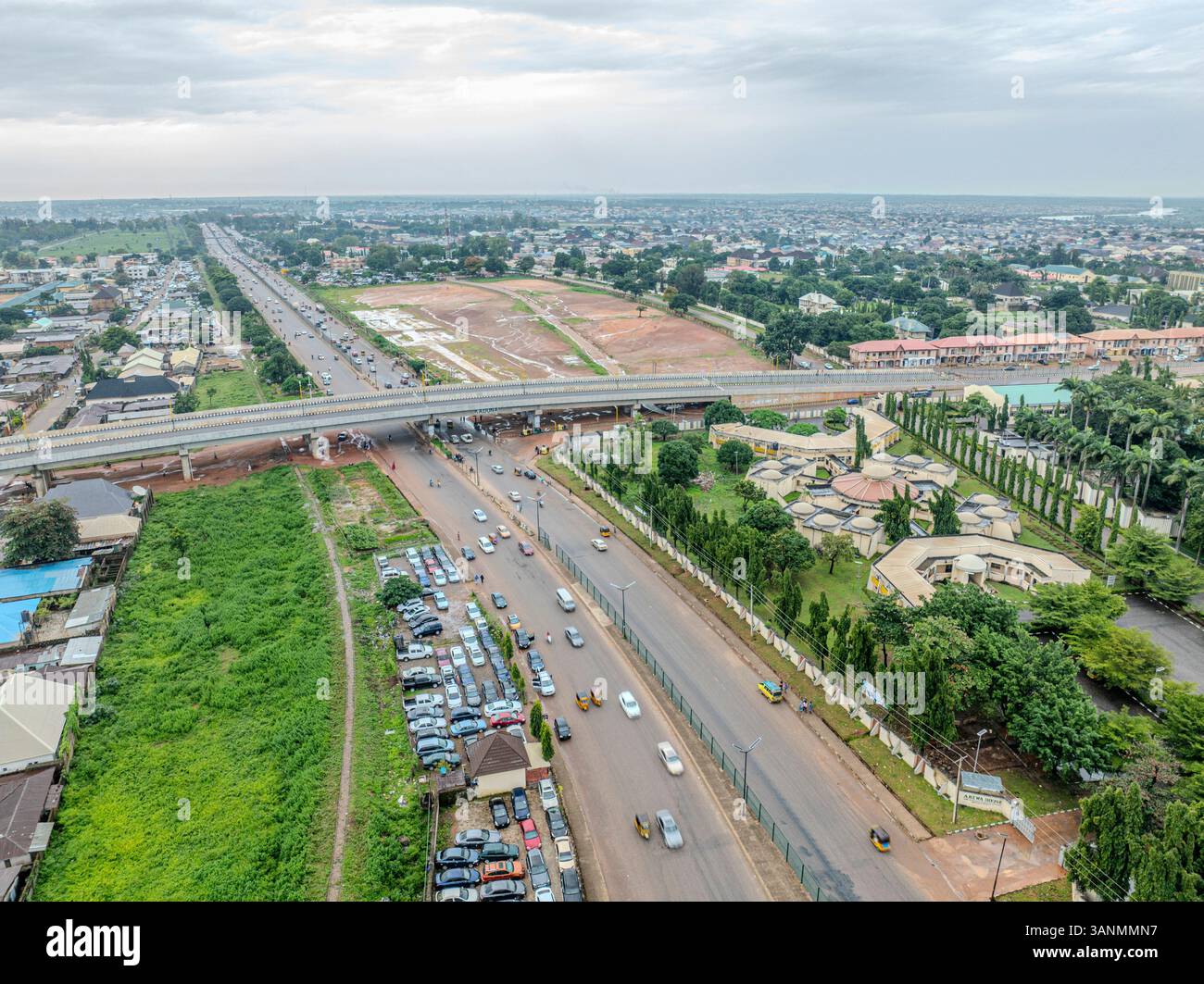 Aerial view of urban landscape featuring buildings, roads, and a museum ...