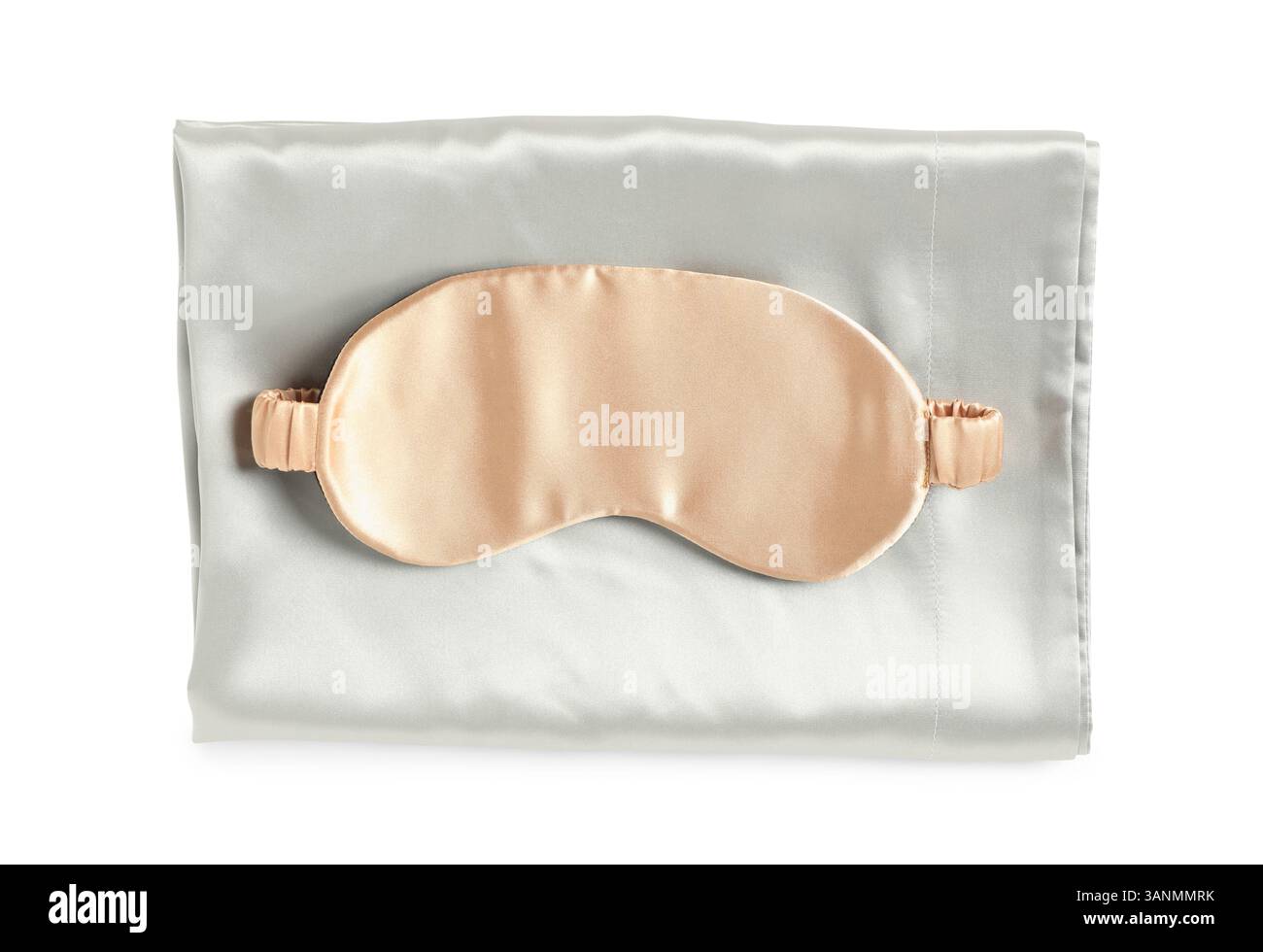 Silky bed linens and sleeping mask on white background, top view Stock ...