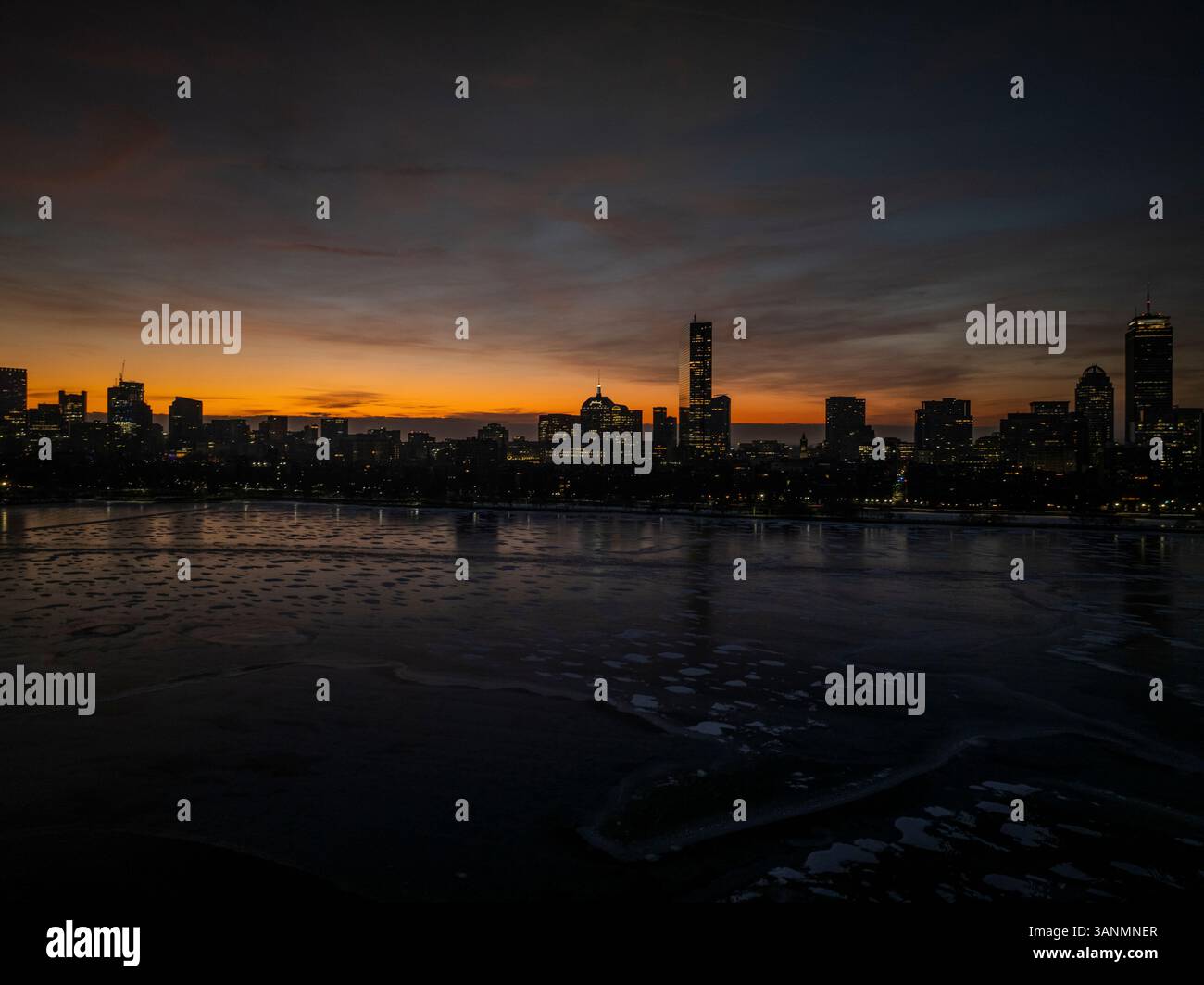 Aerial view of boston skyline at sunset with charles river, john ...