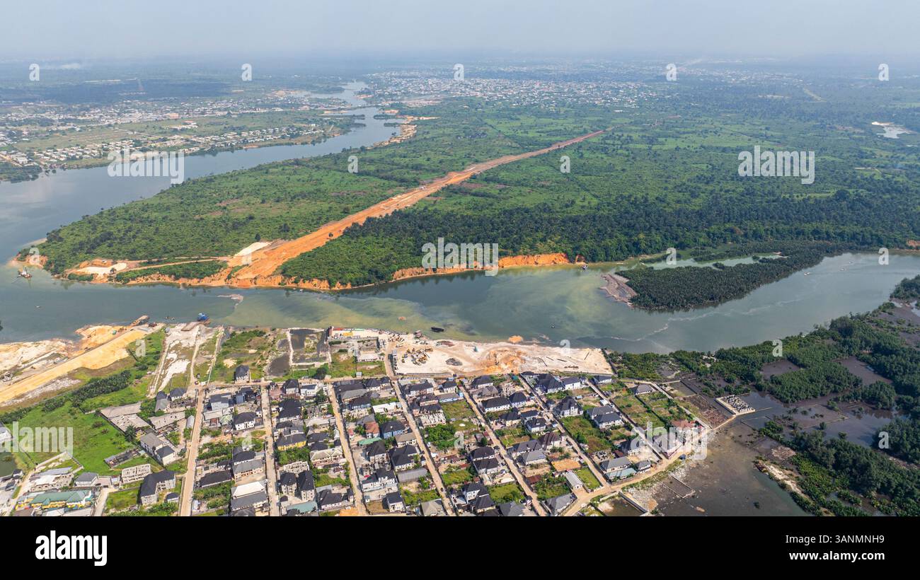 Aerial view of scenic Port Harcourt with river, buildings, and greenery ...