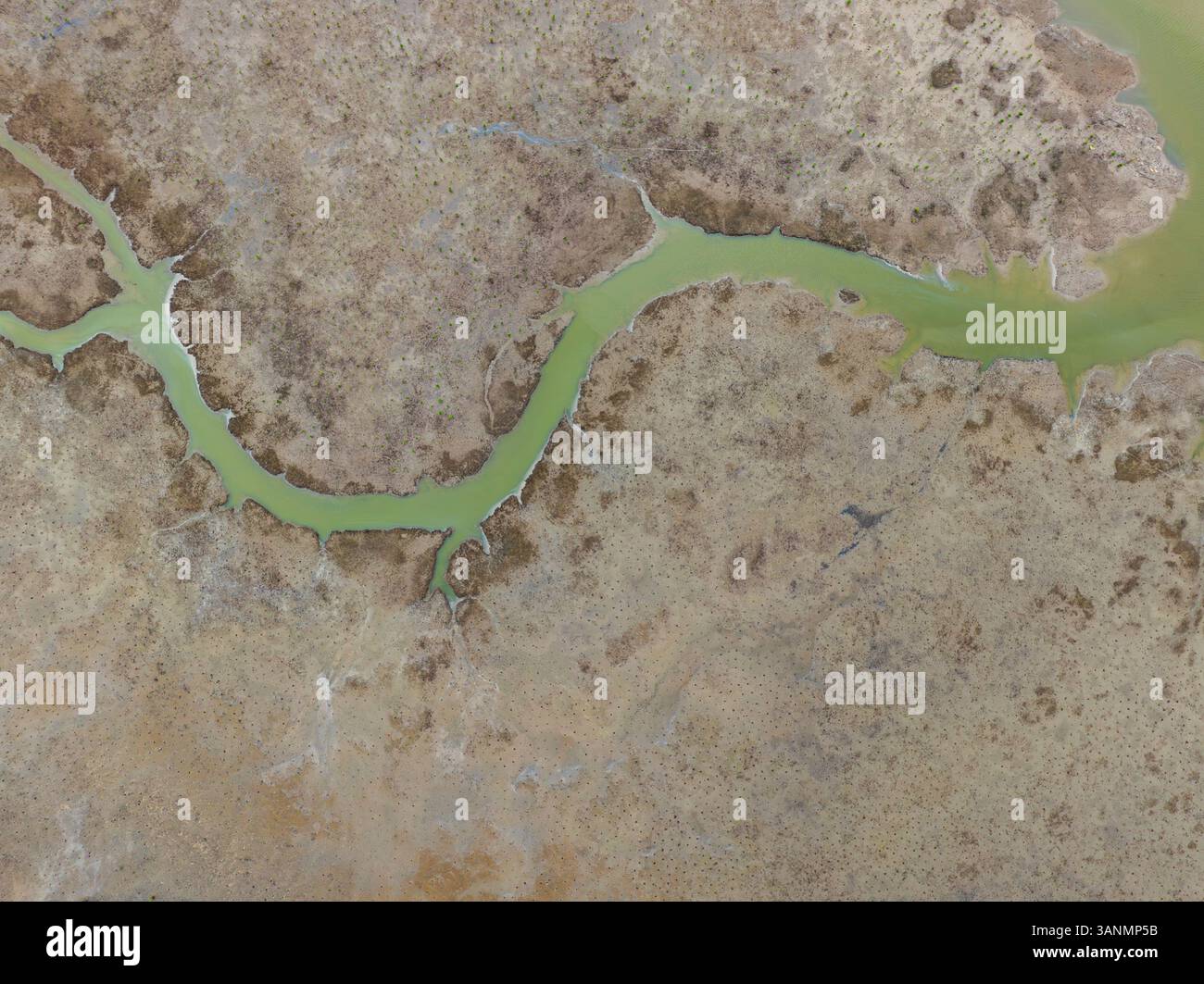 Aerial view of the beautiful Bodo River with natural patterns and ...