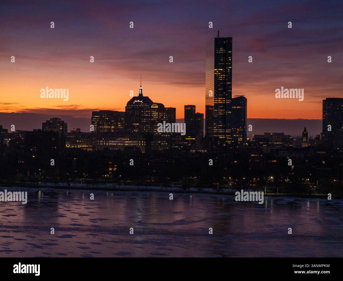 Aerial view of john hancock building and charles river at sunset with ...
