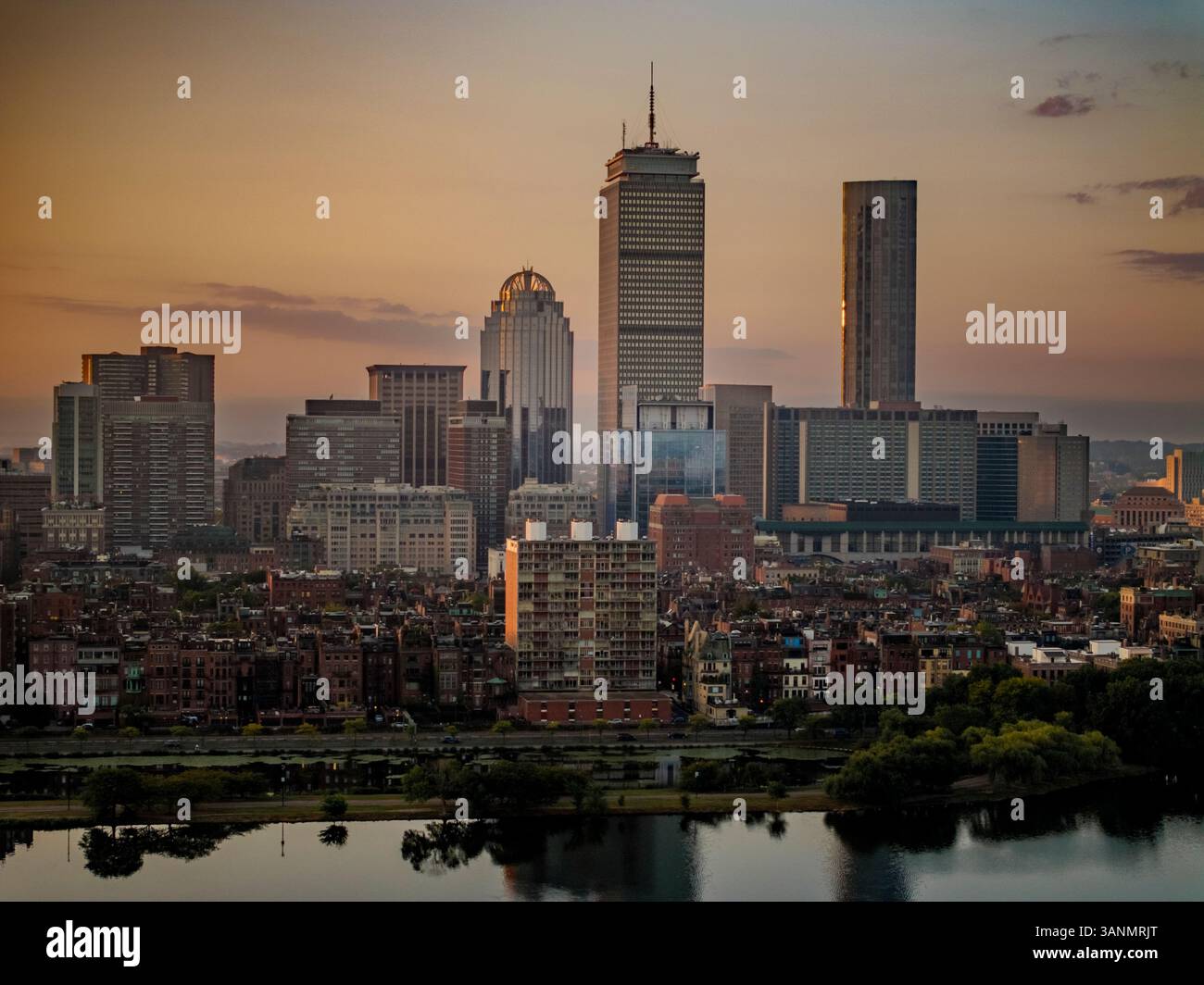 Aerial view of boston skyline at sunset with prudential center and john ...