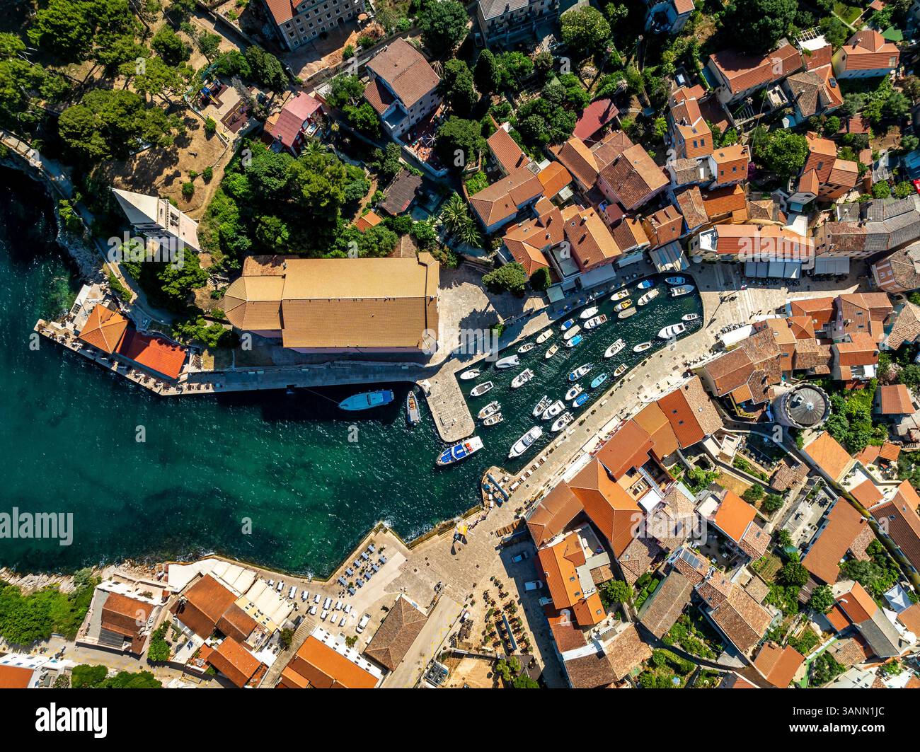 Aerial view of coastal town with sailboats and marina, Veli Losinj ...