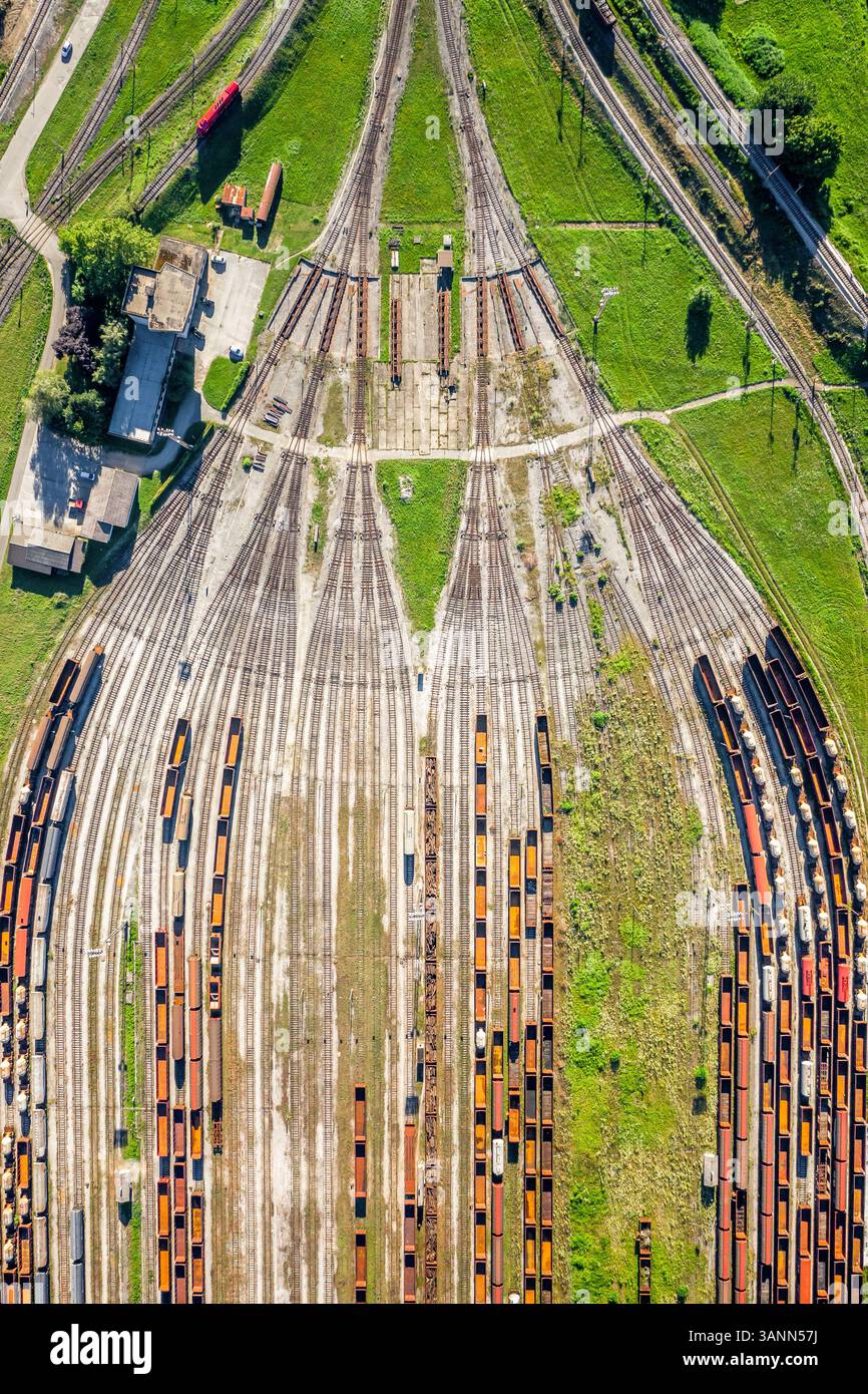 Aerial view of cargo trains stationed on rail tracks Stock Photo - Alamy
