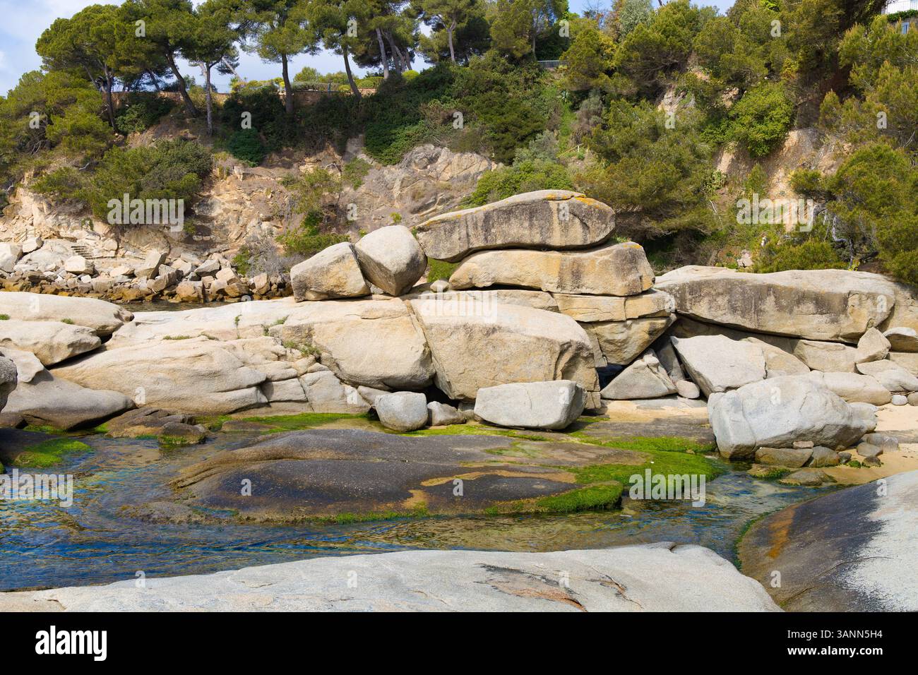 Stacked smooth rock formations at Punta Rocas Planes, Costa Brava ...
