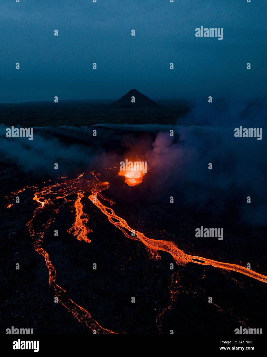 Aerial view of Litli-Hrutur (Little Ram) Volcano during an eruption on ...