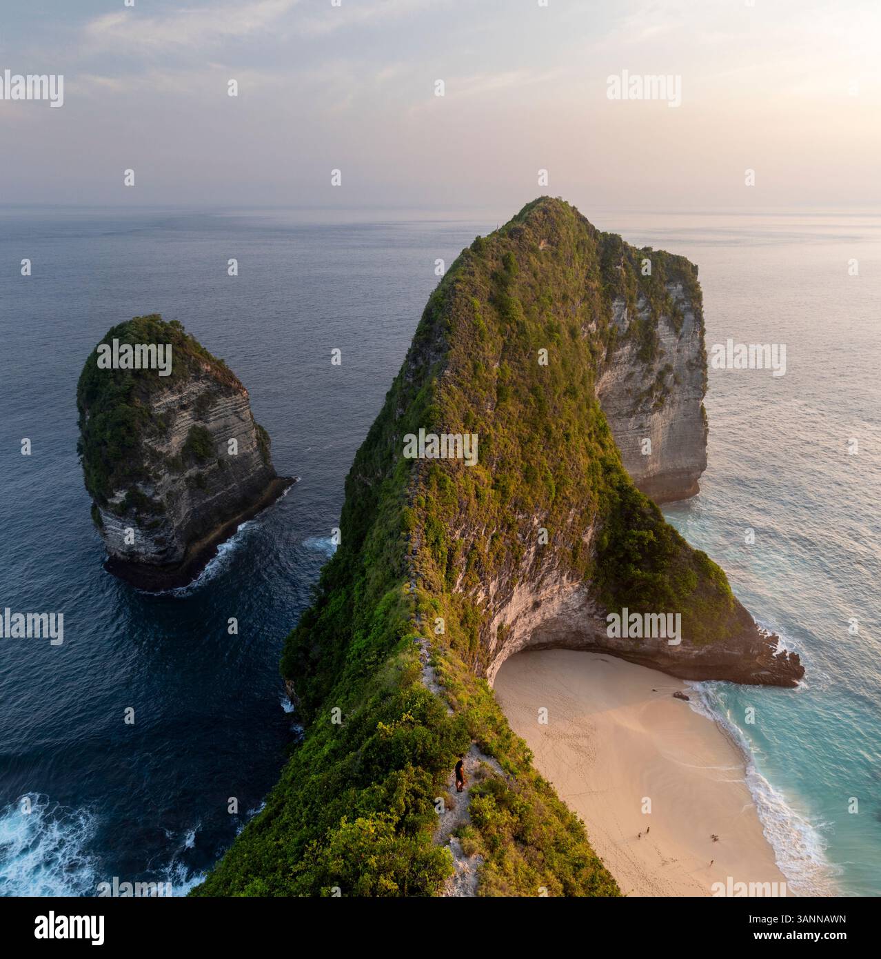 Aerial view of kelingking beach with stunning cliffs and azure waters ...