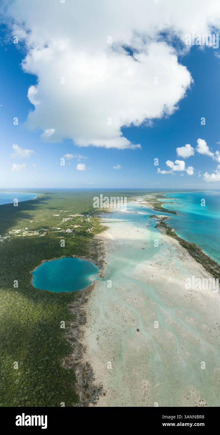 Aerial view of beautiful turquoise lagoon and pristine coastline with ...