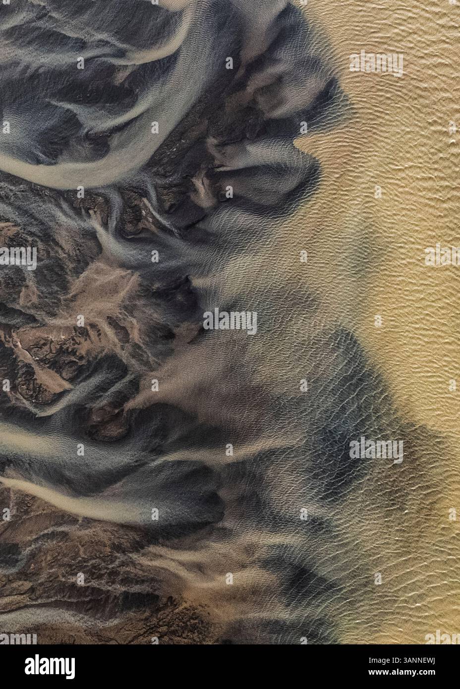 Aerial view of abstract water formation from a river estuary at Holtsos ...