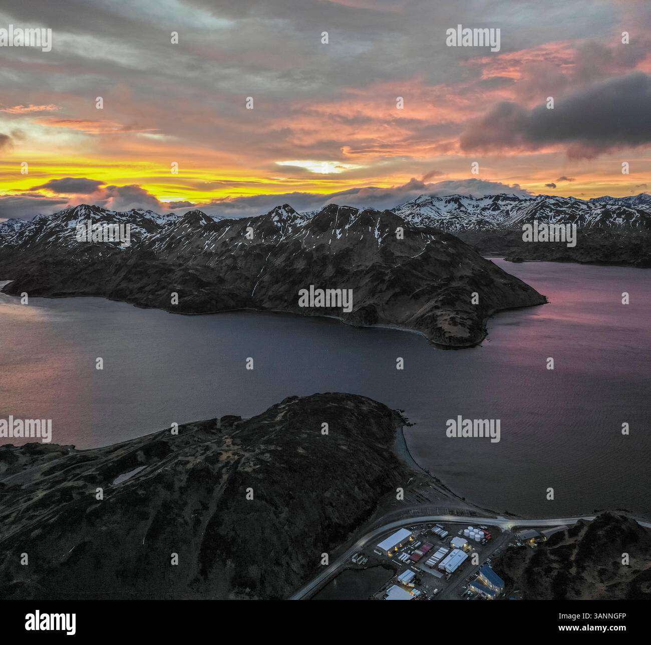 Aerial view of a mountain range with snow on the crests along the Dutch ...