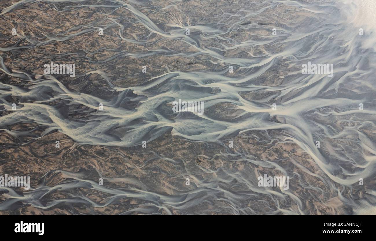 Aerial view of abstract water formation from a river estuary at Holtsos ...