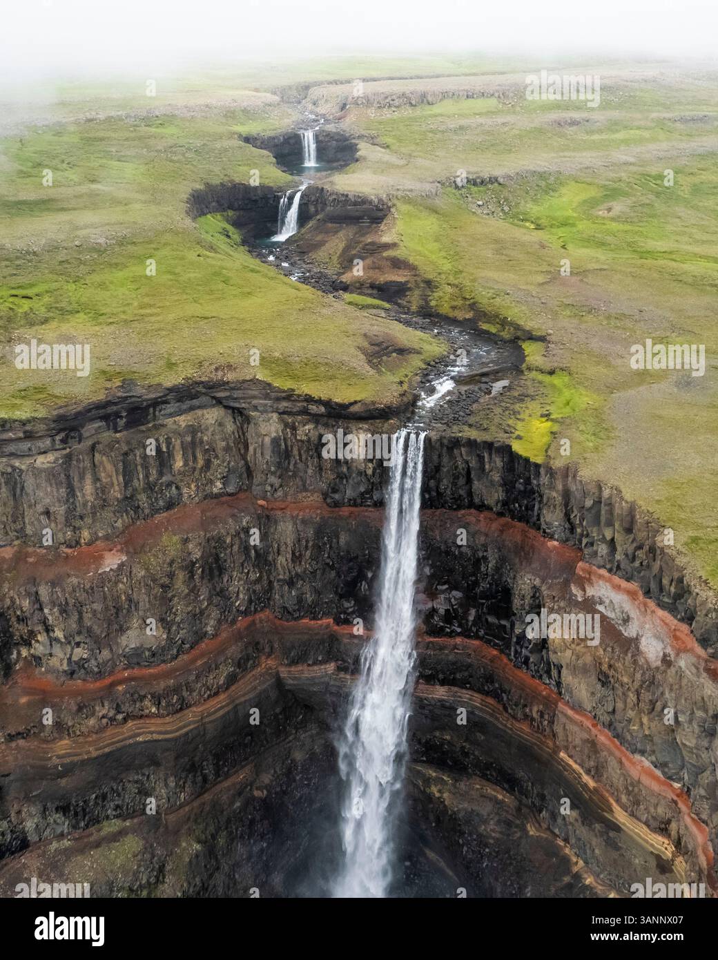 Aerial view of Litlanesfoss waterfall in Fljotsdalshreppur, Iceland ...