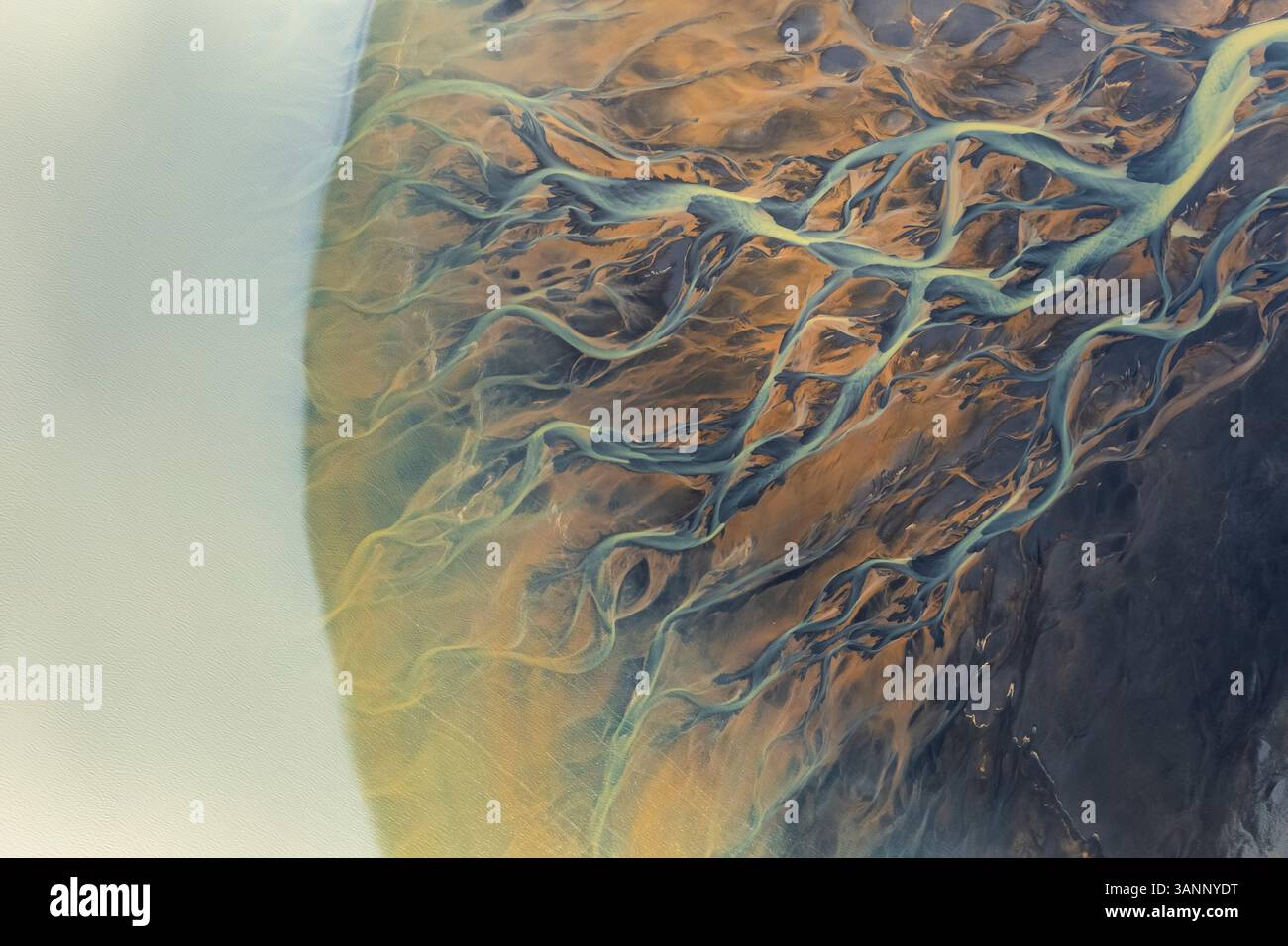 Aerial view of a river estuary meeting the ocean in Southern region ...