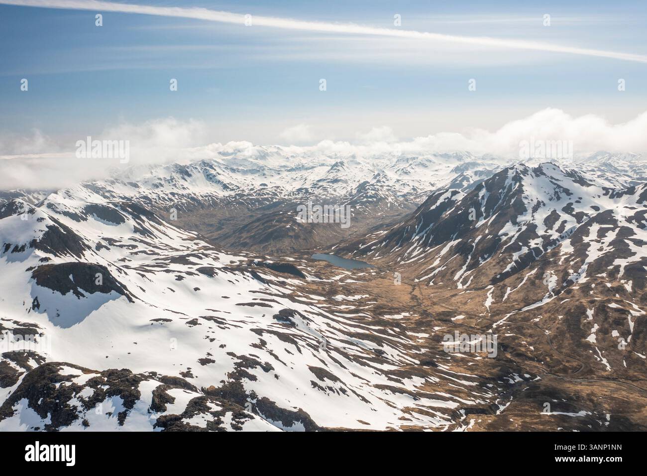 Aerial view of a mountain landscape in wintertime on Unalaska island ...