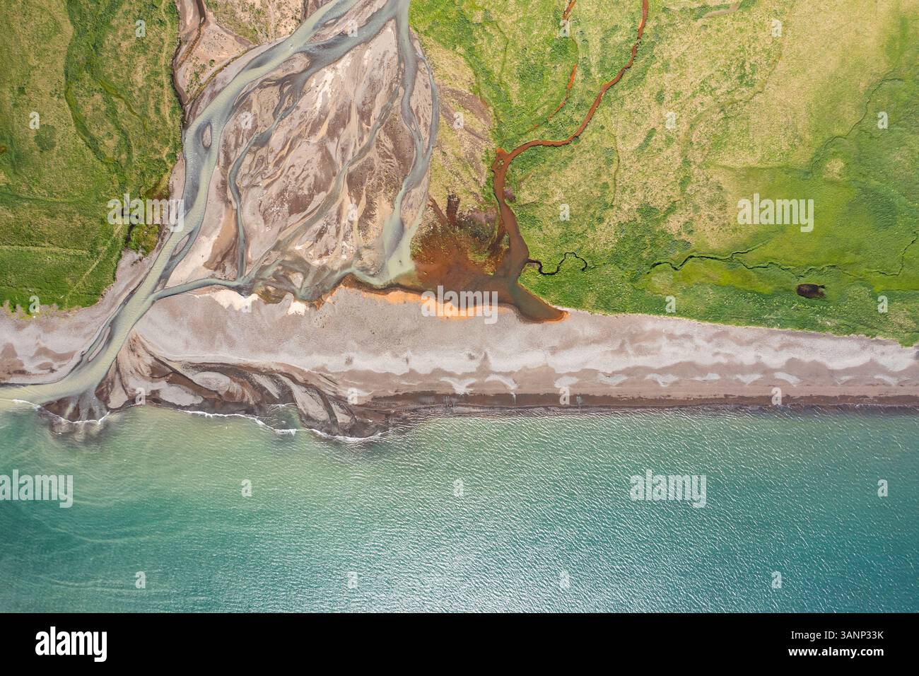 Aerial view of the coastline along Mukushin Bay, Unalaska island ...
