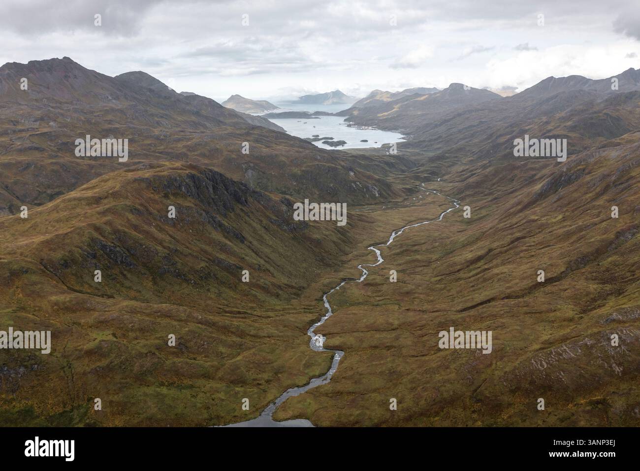 Aerial view of Captain Bay with valley and mountains, Unalaska, Alaska ...